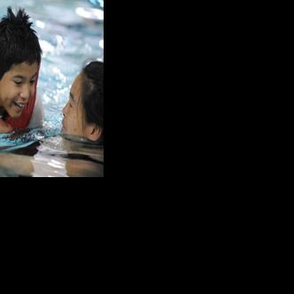 J.H. Hines students get life, swimming lessons