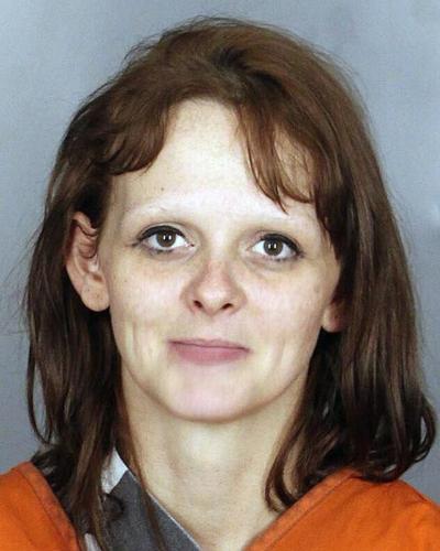 Woman charged with leaving child in car