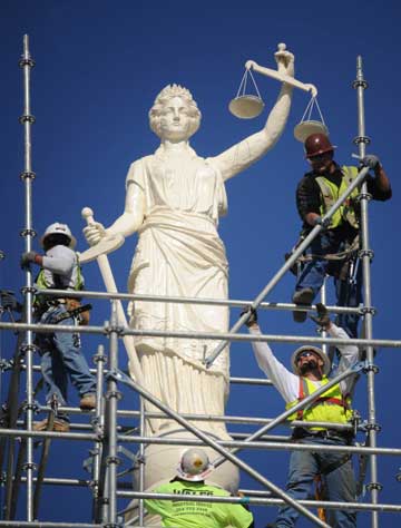 Restored Themis back on her throne atop courthouse