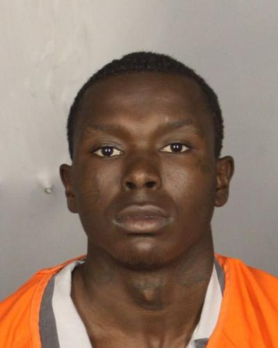 Man jailed, two sought in robbery