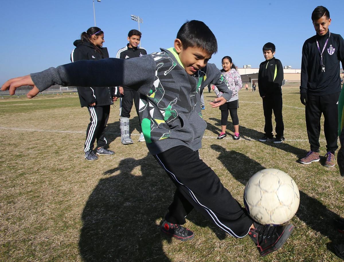 Soccer Buddies learn about positive character, soccer skills