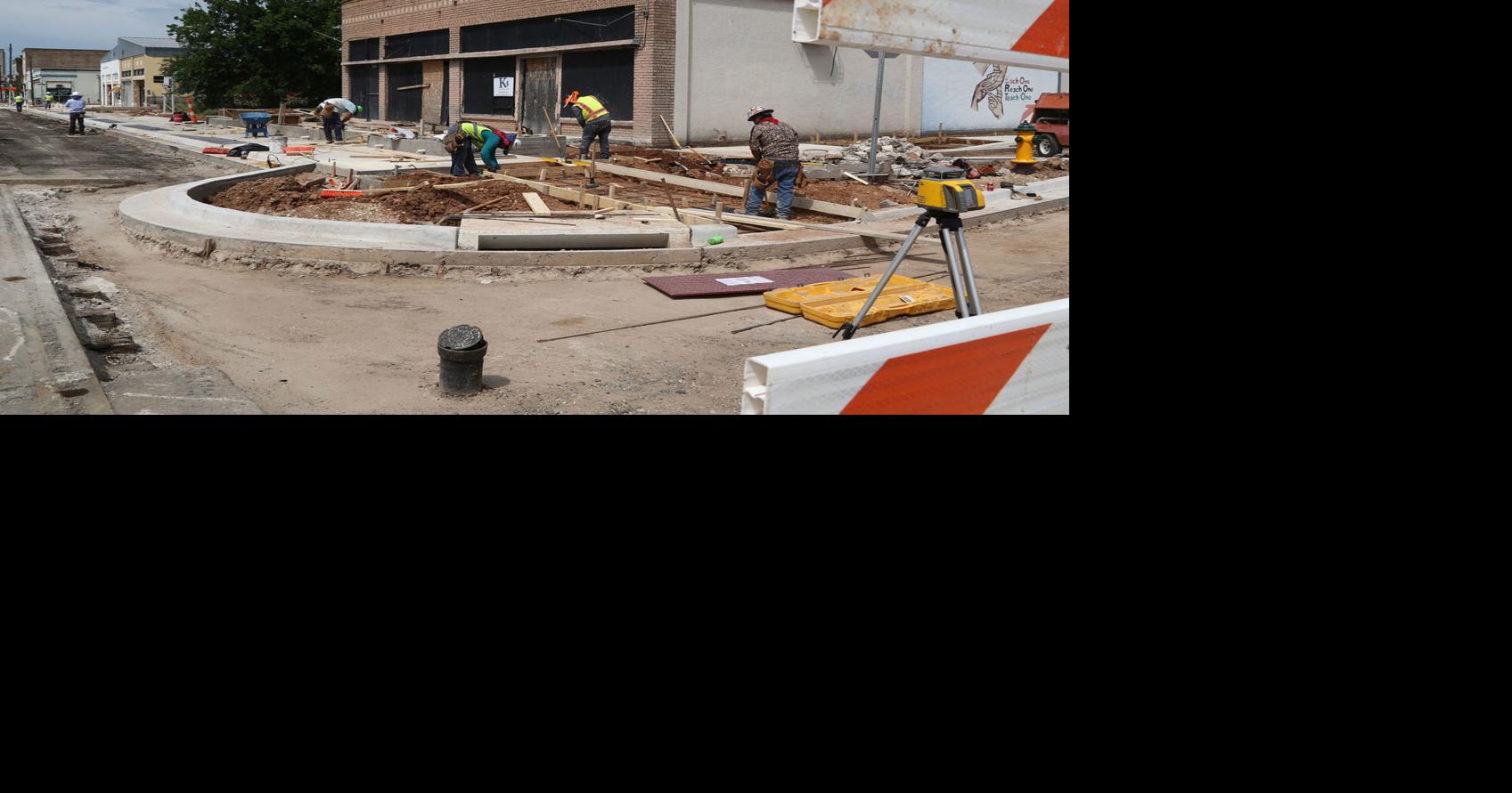 Crews uncover train track, cross ties encased in concrete during Elm ...