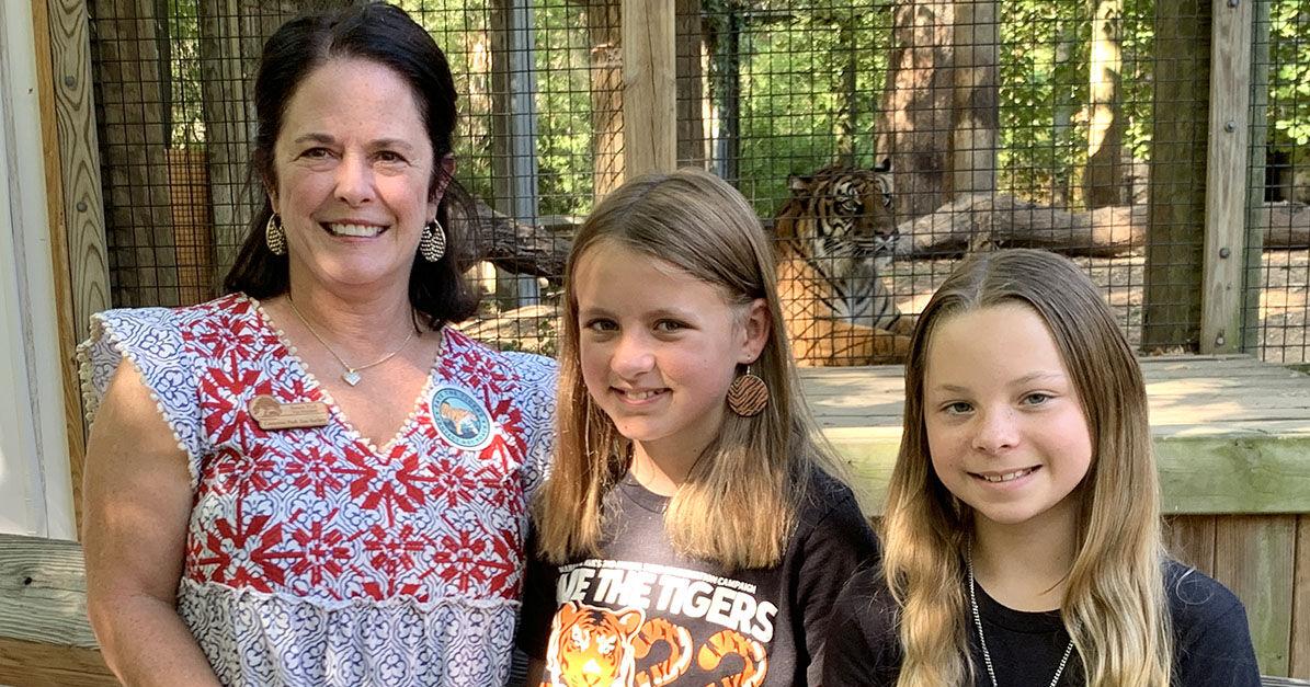 Tiger Girls present donation to zoo