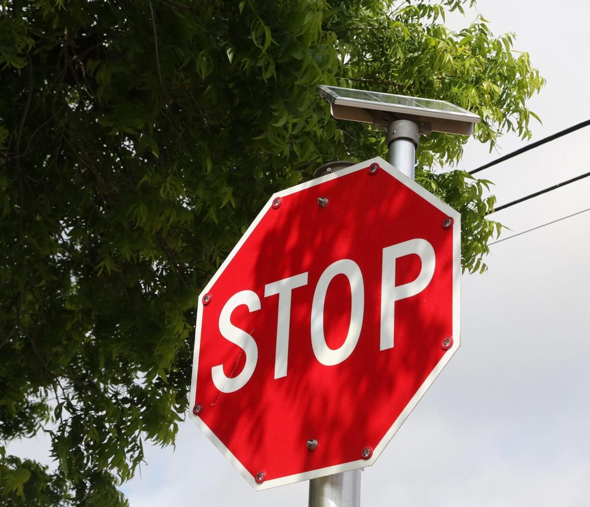 Flashing stop signs installed at busy downtown intersection | Business ...