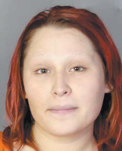 Woman charged with indecency with a child