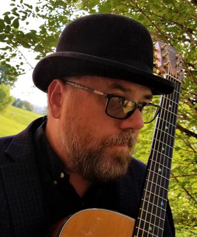 Musician Dennis O'Hagan trades tunes with taps in brewery tour