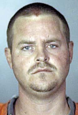 Police say man choked woman, knocked out another man's teeth