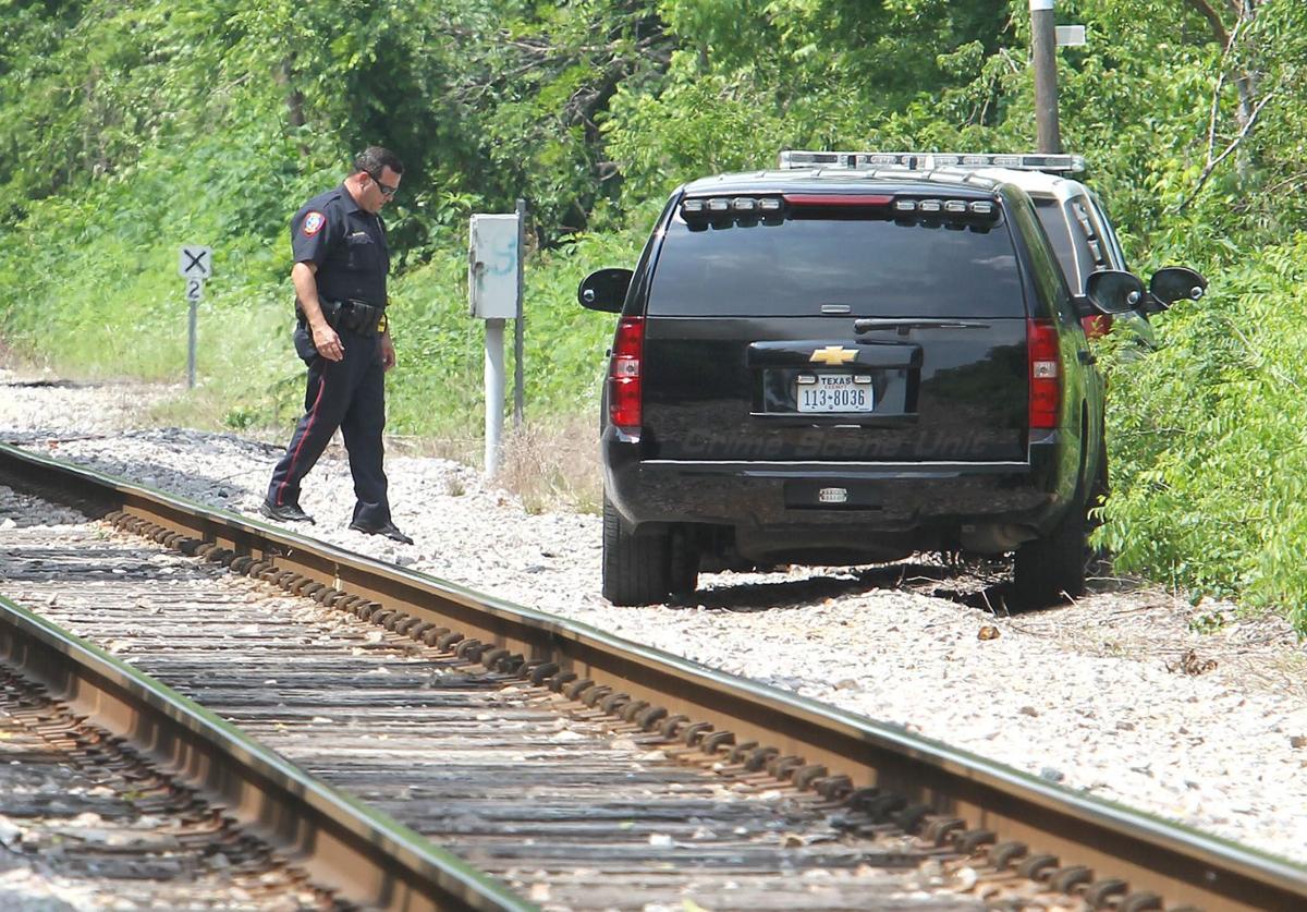 Dead body found near railroad tracks