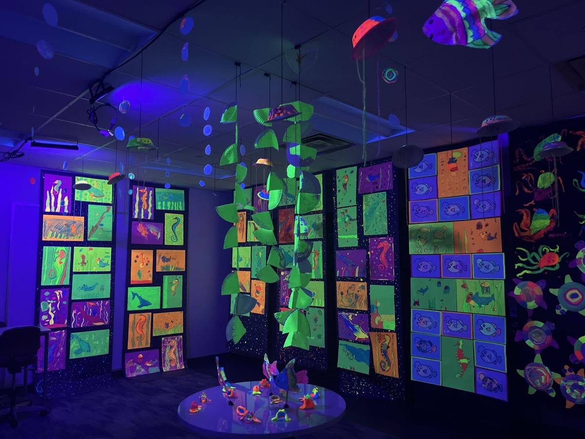 Award-winning Midway art teacher makes splash with undersea exhibit