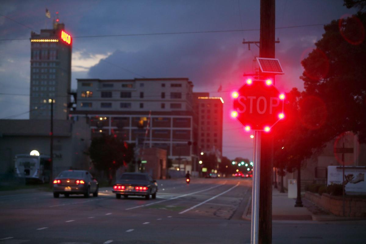 Flashing stop signs installed at busy downtown intersection | Business ...