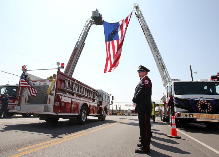 Firefighter honor guards stand watch for fallen