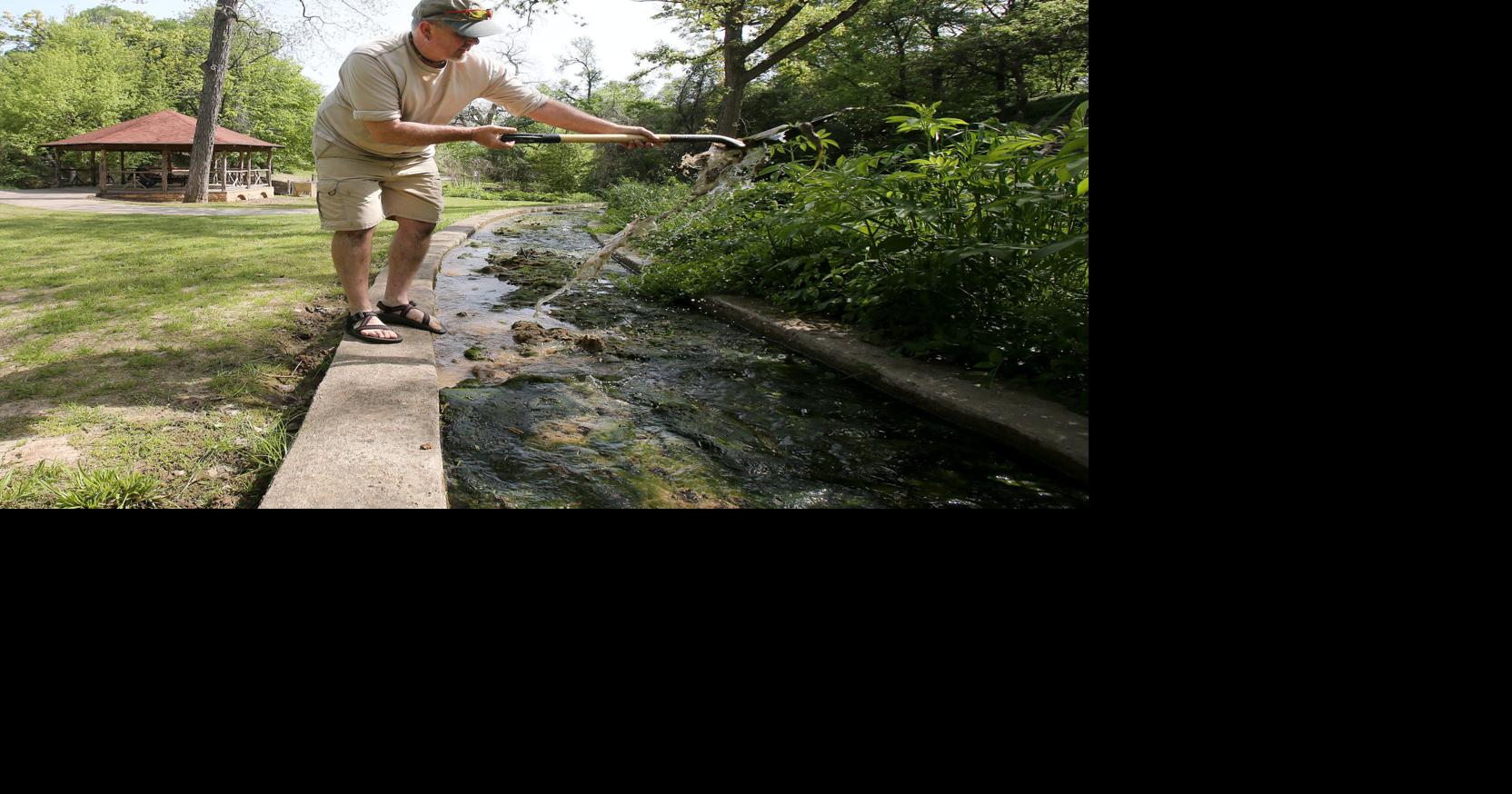 Volunteers chip away at restoring Proctor Springs