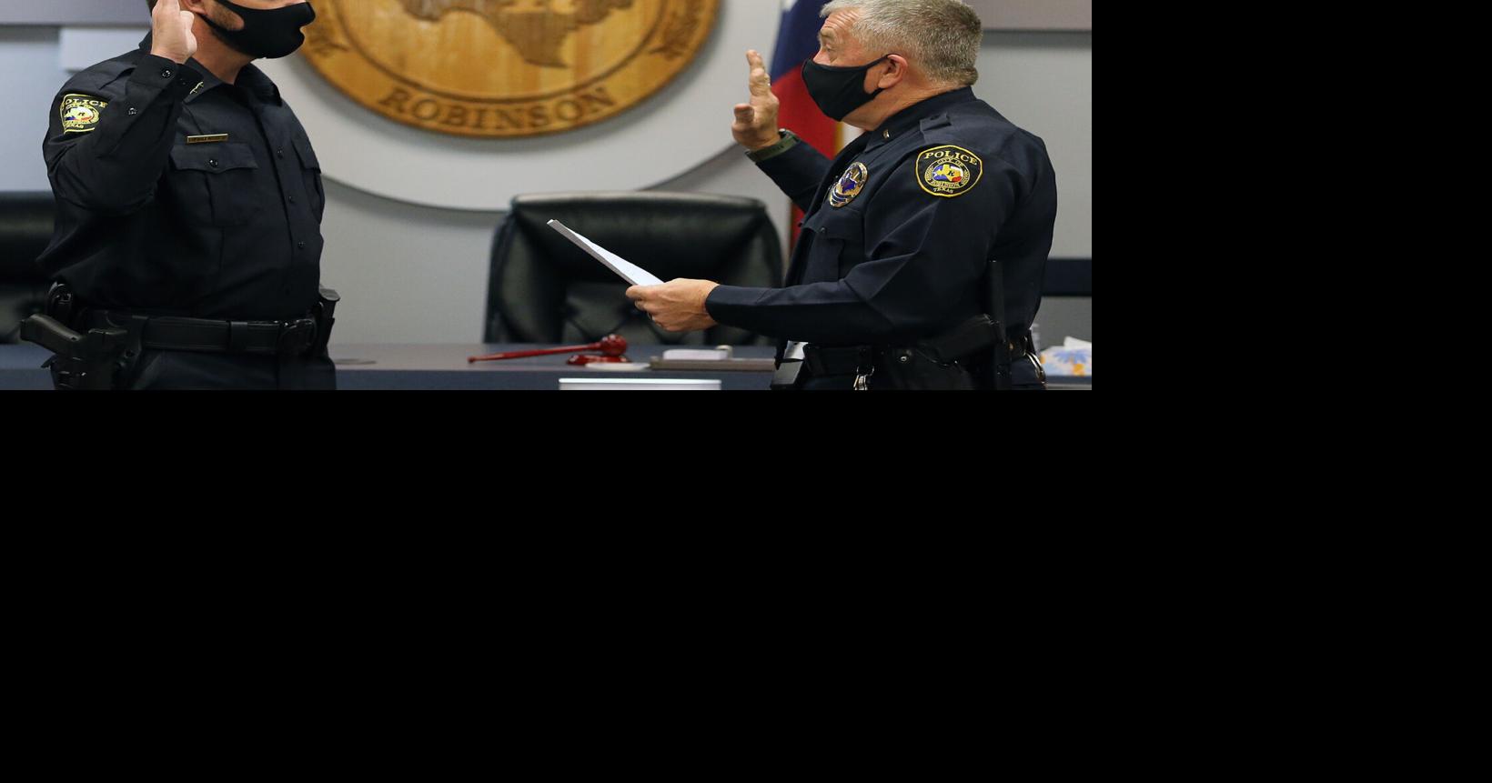 Robinson swears in new police chief