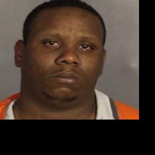 Police recover stolen gun, drugs during traffic stop