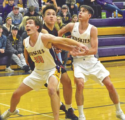 Huskies flex on Roughriders, 61-58 | Local Sports News ...