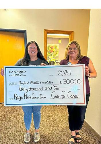 Cares for Cancer donates to Roger Maris Cancer Center | News Monitor ...