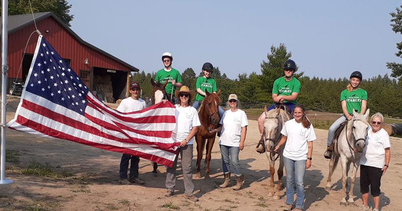 Jack Pine Stables receives flag from Walker SAL | News | walkermn.com