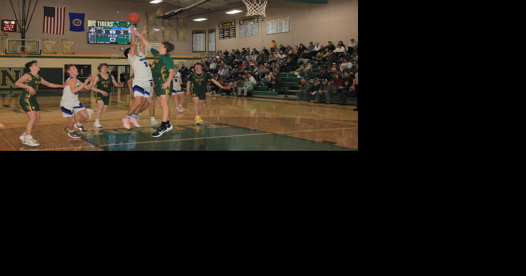 Lealan Norby goes up to partially block this shot by Niko Morrow in the ...