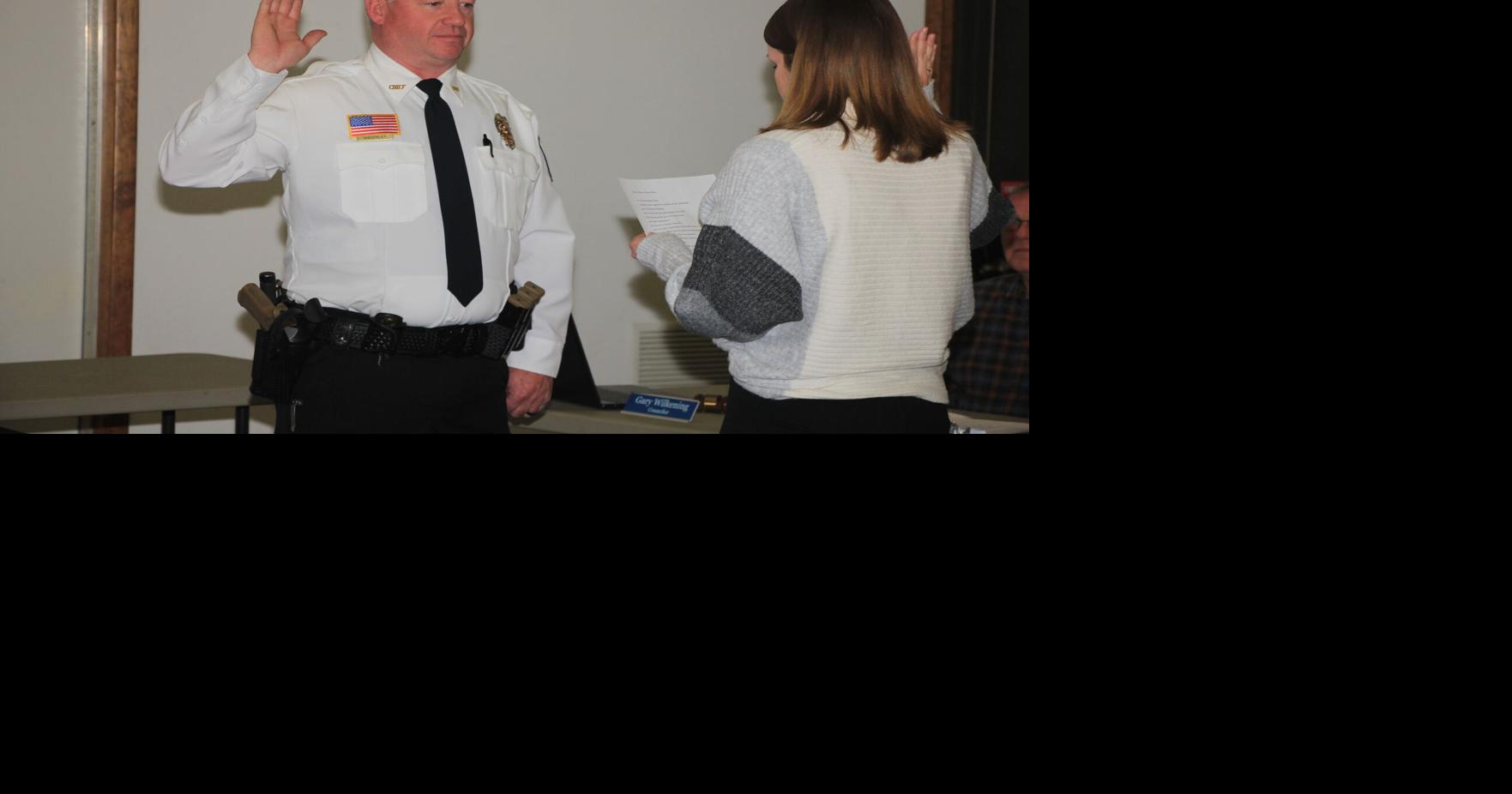 ‘Top cop’ sworn in as Walker’s new chief; Chief Tennis recognized ...