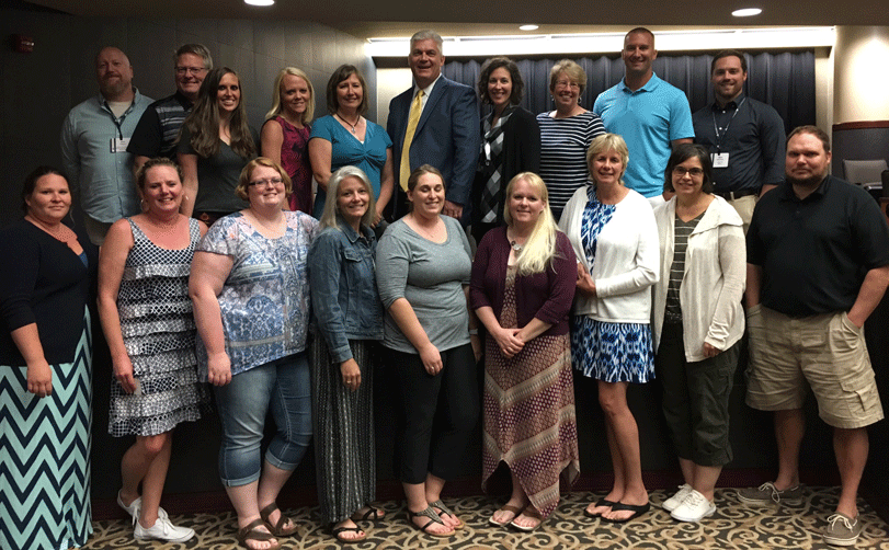 Pictured are (front row from left) Natalie Asell, Erica Strandlie ...