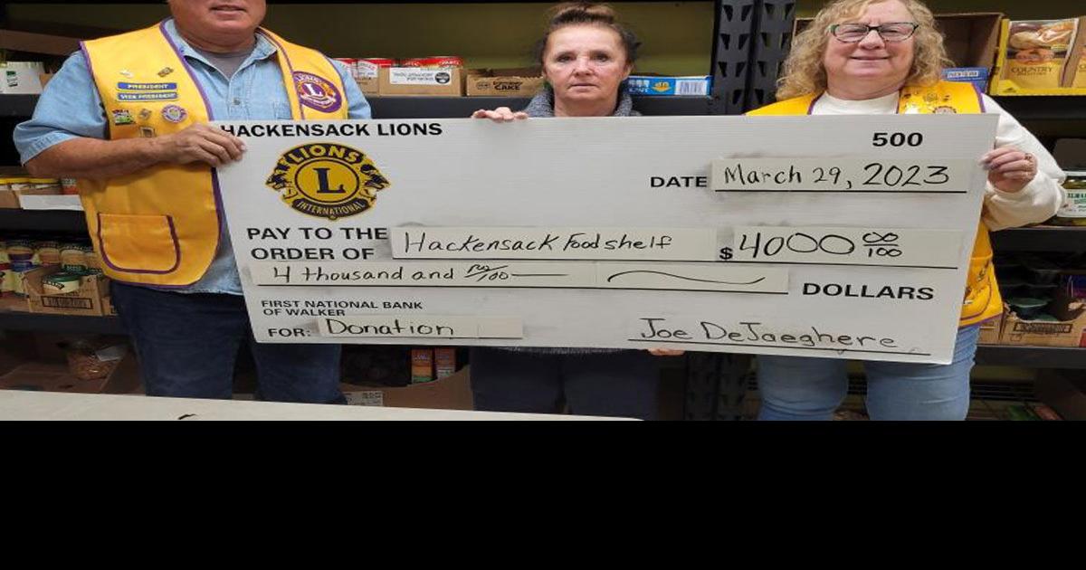 Pictured are Lion President Joe DeJaeghere (left) and Lion Julie Cline ...