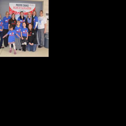 PTO volunteers (front from left to right) Emma Landreville, Phillip ...