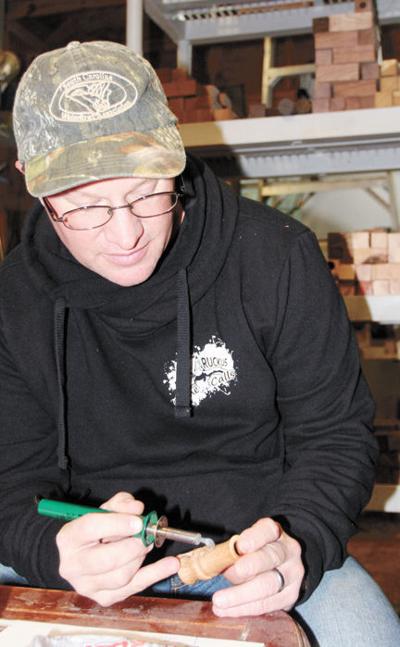 Between man builds animal call business in garage | Business ...