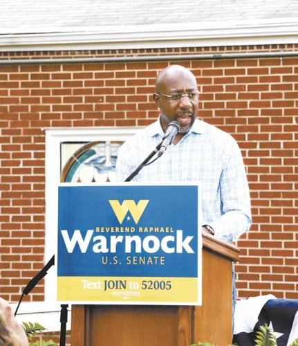 Warnock brings re-election campaign to Monroe | News | waltontribune.com