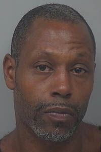 Man charged with trying to break into gun shop with saw | News ...