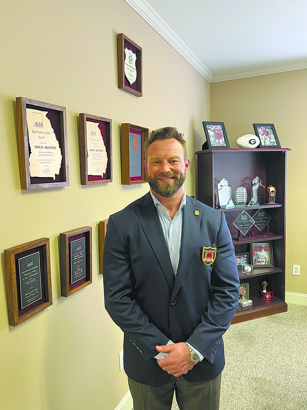 BUSINESS: Blevins earns Hall of Fame honors | Business | waltontribune.com