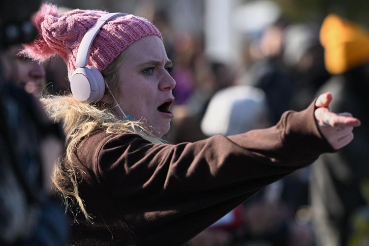 Photos from Minneapolis where an ICE officer killed a woman during an immigration crackdown ...