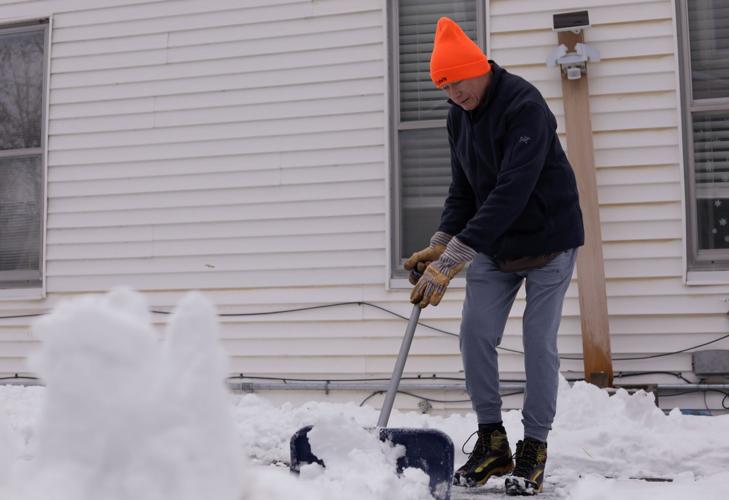 Winter storms bring snow, ice and school and road closures to New ...