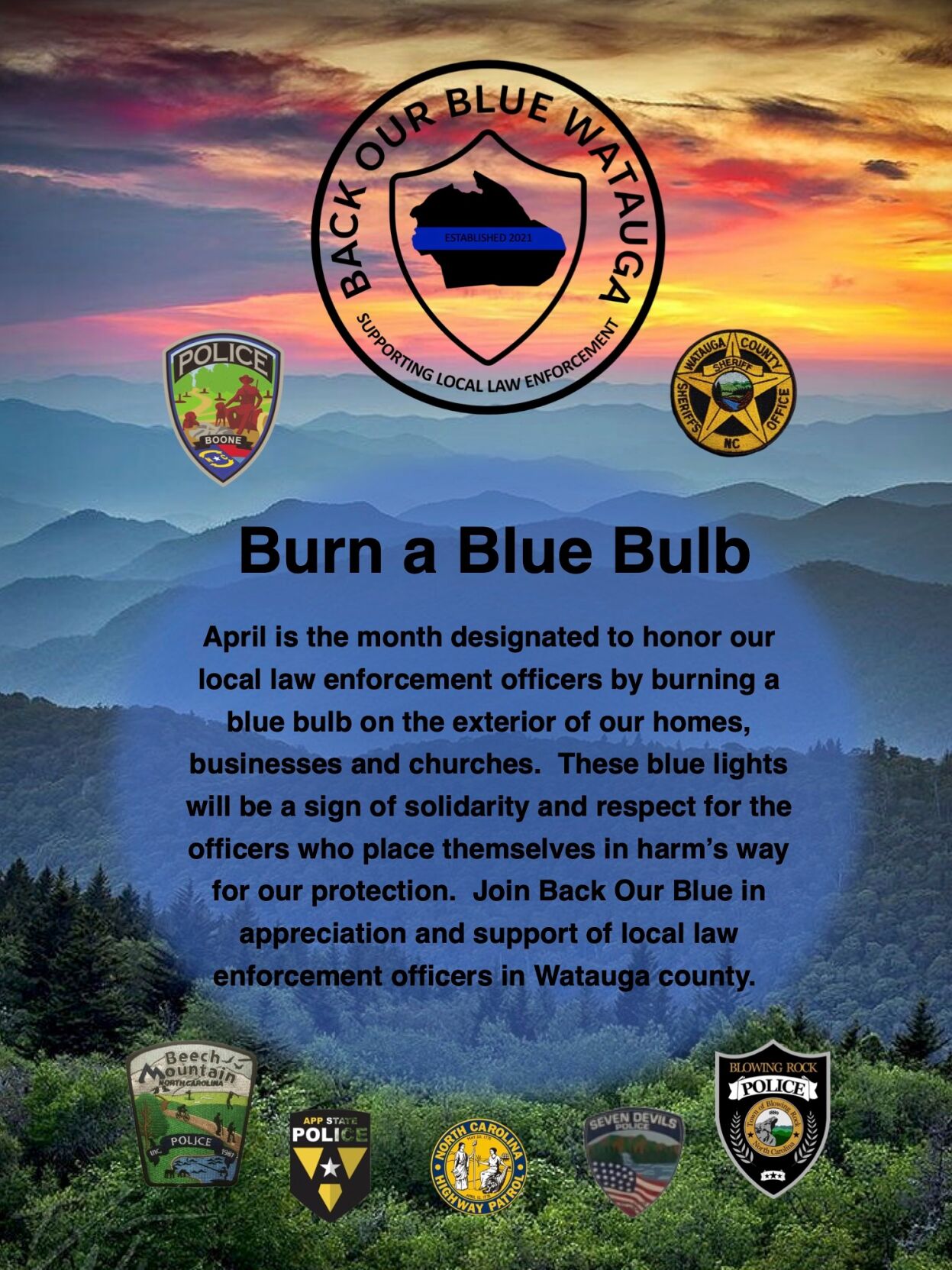 Boone lighting town buildings with blue lights during April in ...
