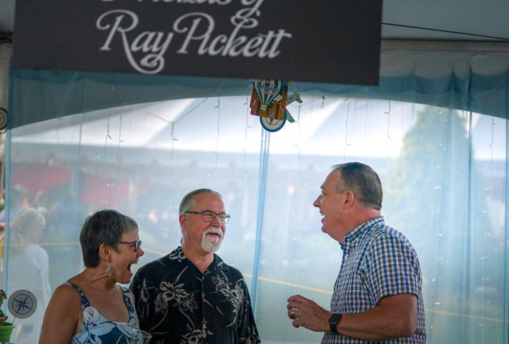Big beaming smiles abound as Symphony by the Lake goes around the world ...