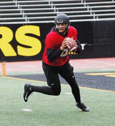 Brown making transition from high school student to college quarterback ...
