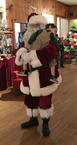 Santa greets Ashe County children | Entertainment | wataugademocrat.com