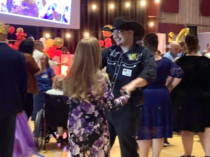 Joy Prom attendees celebrate 10th annual dance | Multimedia ...