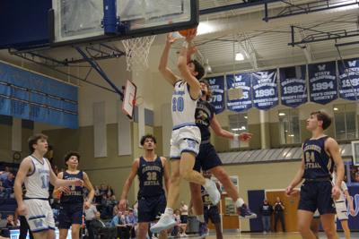 WHS boys basketball moves to 3-0 in conference with wins over Freedom ...