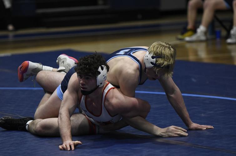 Smith, Casner earn top finishes at wrestling regionals, move on to ...