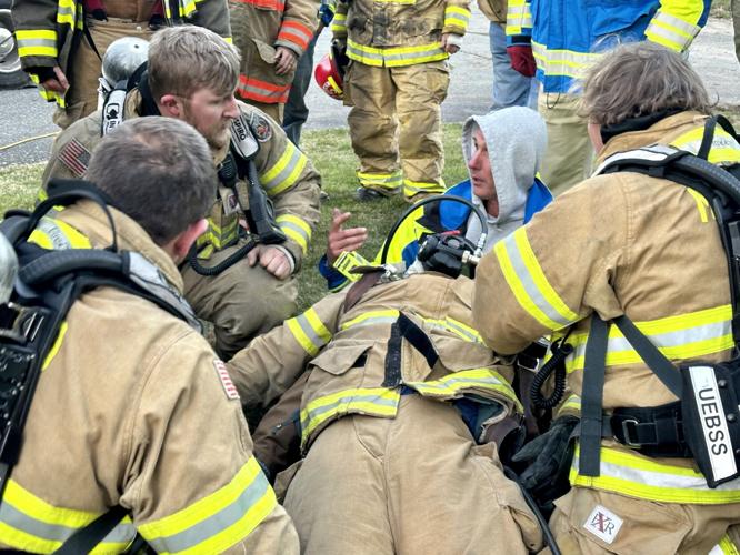 Multiple departments conduct joint firefighter down training | Local ...