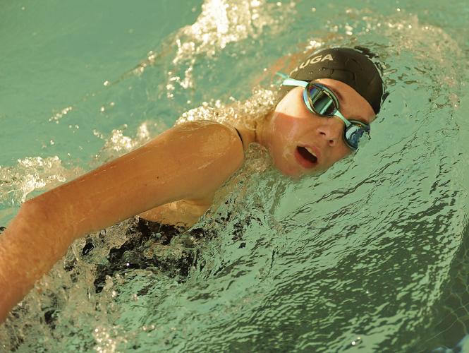 Lucky No. 7: Lady Pioneer swim defends NWC title, Spartans squeak past ...