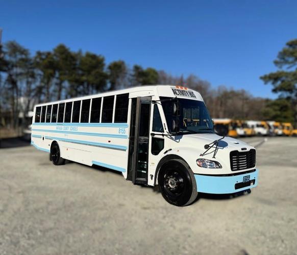 WCS athletic director surprised with new activity bus | Local News ...