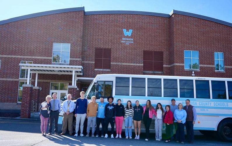 WCS athletic director surprised with new activity bus | Local News ...
