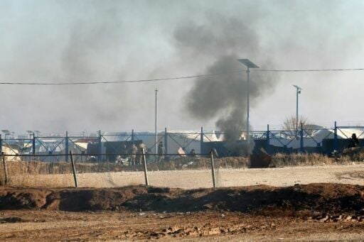 US begins IS prisoner transfer as Syria govt, Kurds trade attack blame ...