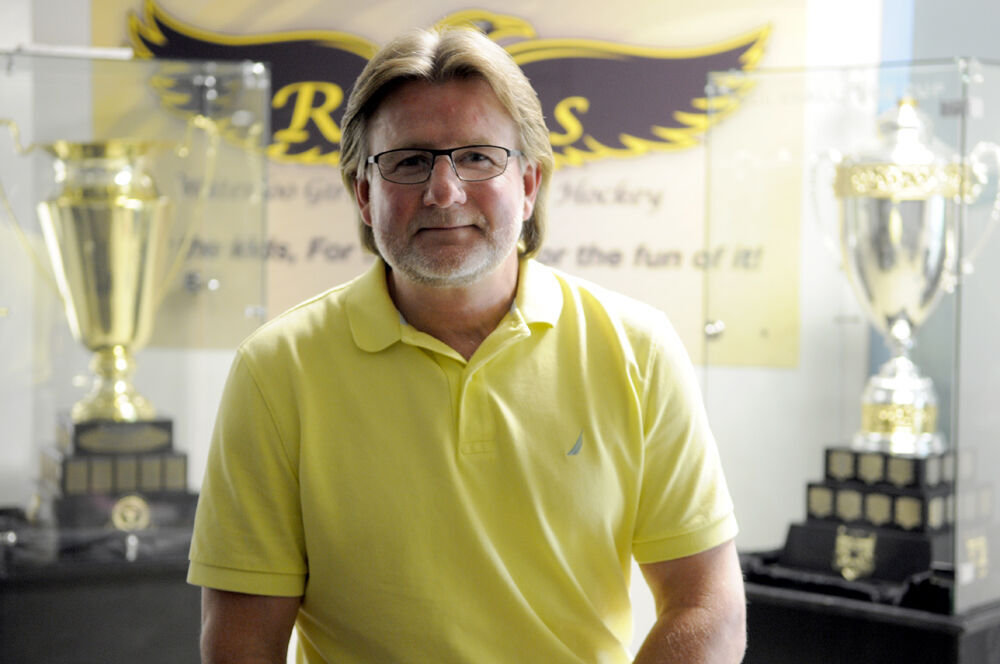 Ravens' Hennig retires after 15 years