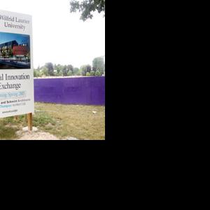 New Laurier building a year behind schedule