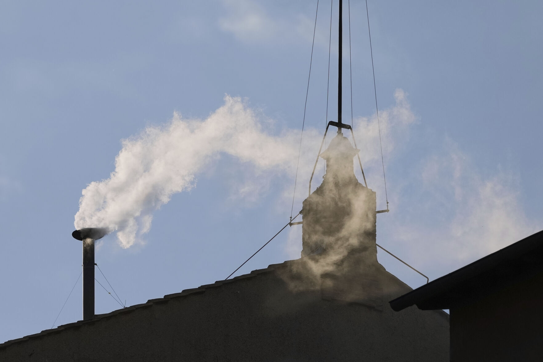 New pope selected as white smoke pours out from Vatican