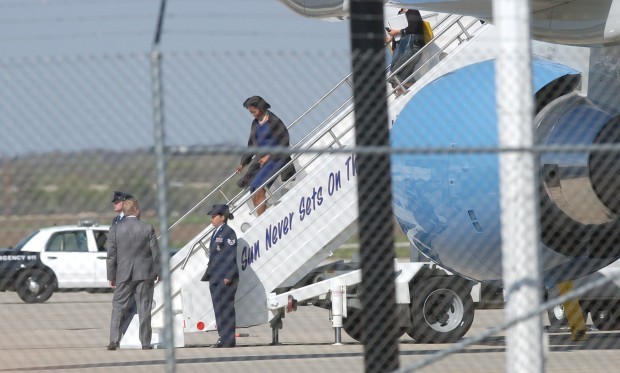 First crowds line up at airport for glimpse of first lady