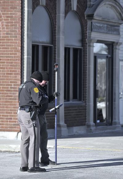 VICTIM IDENTIFIED: Woman dead, suspect in custody after bank robbery in ...