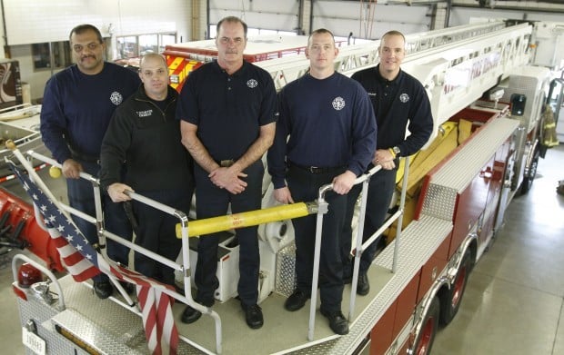 Waterloo firefighters who rescued girls from burning home honored